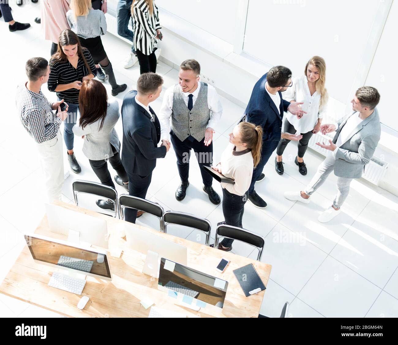 top view. group of employees in a modern office Stock Photo - Alamy