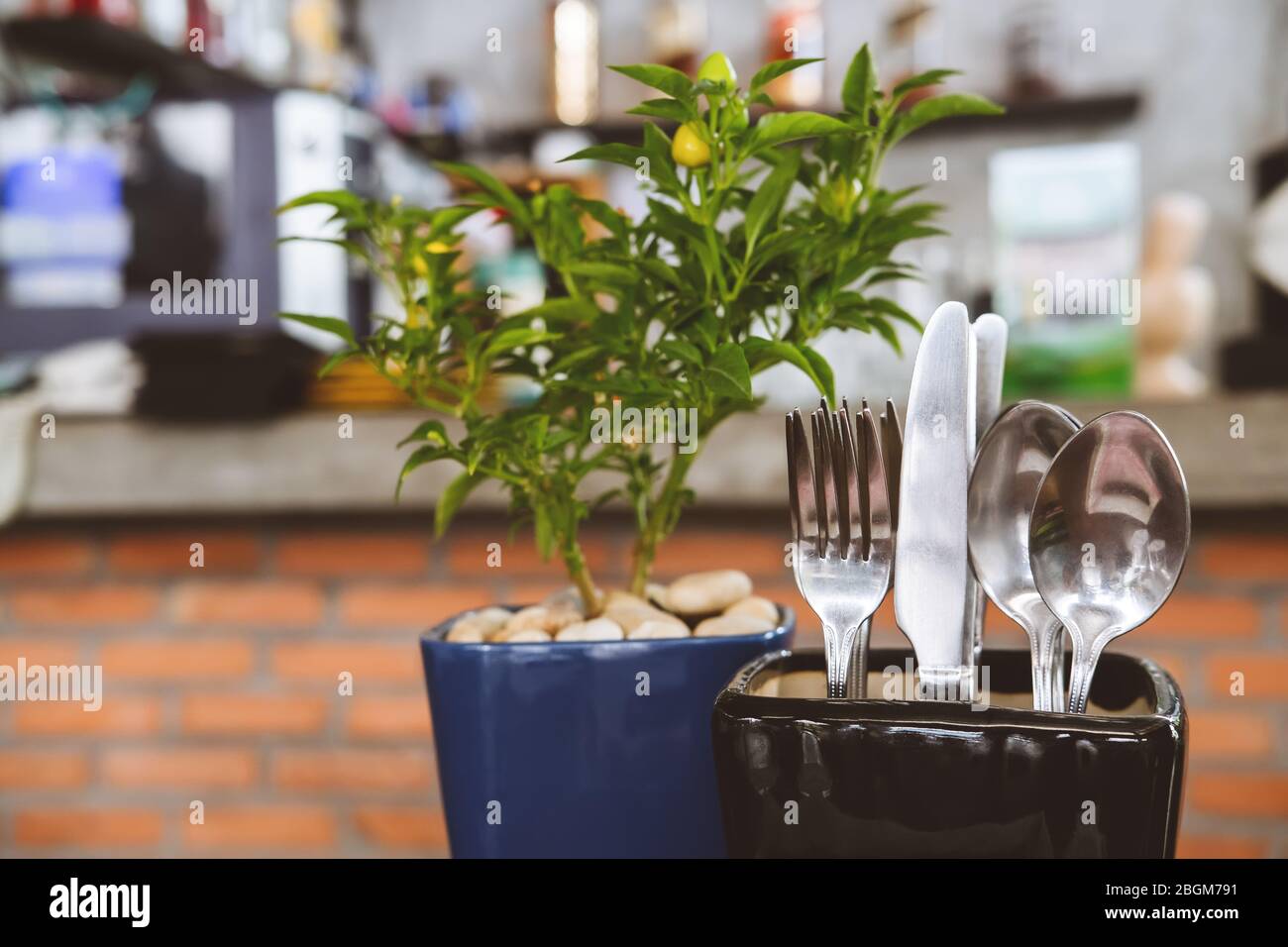 Cutlery set creatively placed on the restaurant table. Modern design ...