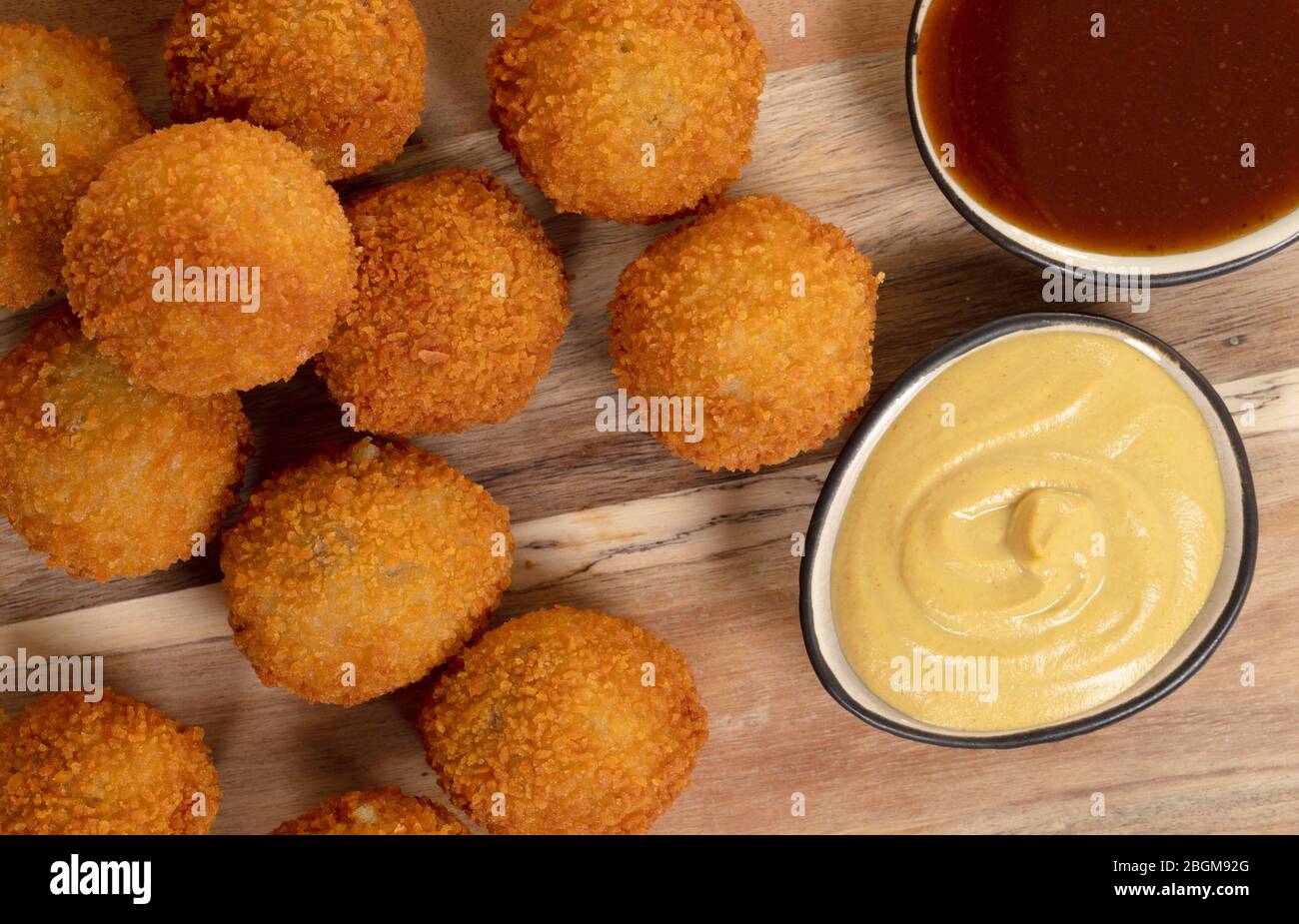 Dutch traditional snack bitterbal on a serving board, isolated Stock ...