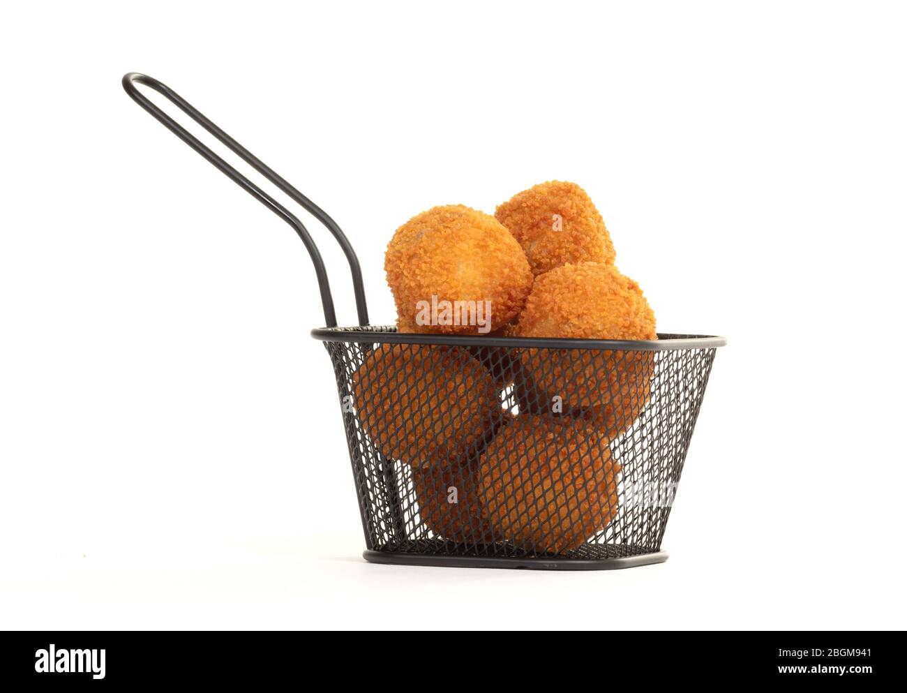 Dutch traditional snack bitterbal in a small basket, isolated Stock ...