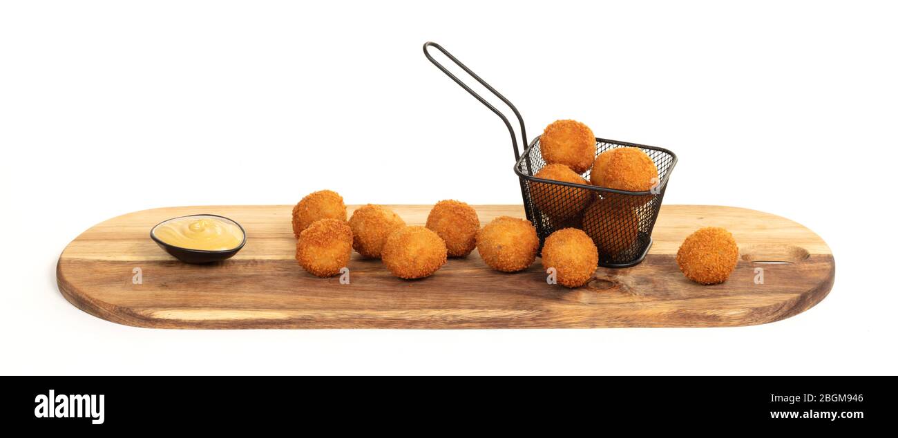 Dutch traditional snack bitterbal on a serving board, isolated Stock ...