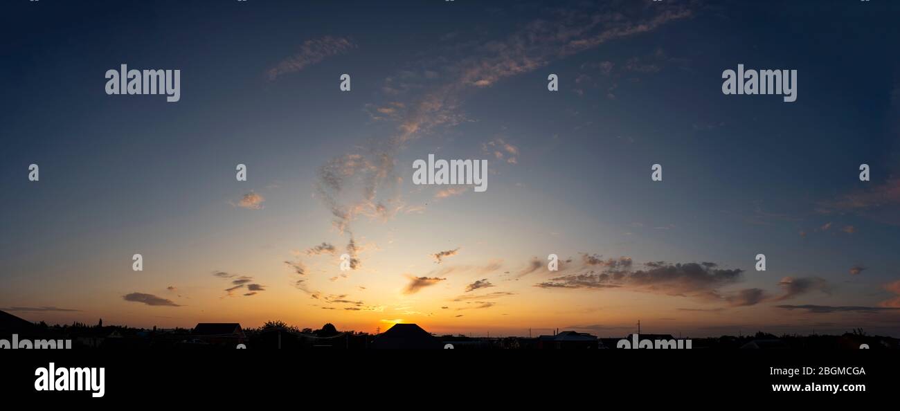 Sunset panorama with clouds high resolution Stock Photo - Alamy