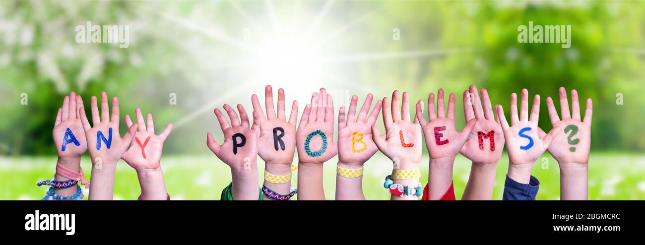 Children Hands Building Word Any Problems, Grass Meadow Stock Photo - Alamy