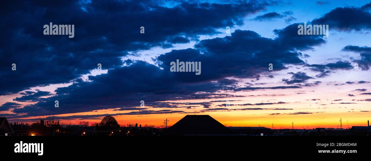Sunset panorama with clouds high resolution Stock Photo - Alamy