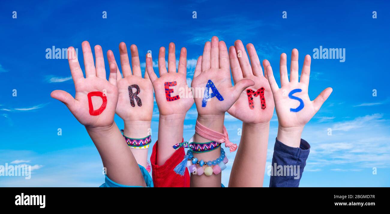 Children Hands Building Word Dreams, Blue Sky Stock Photo - Alamy