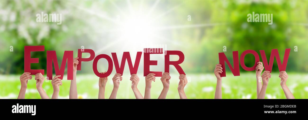 People Hands Holding Word Empower Now, Grass Meadow Stock Photo - Alamy