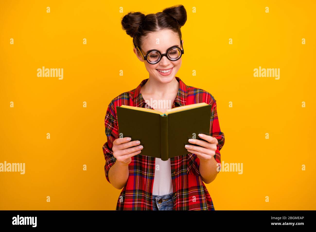 Photo of pretty crazy lady two buns hold open book diligent student ...