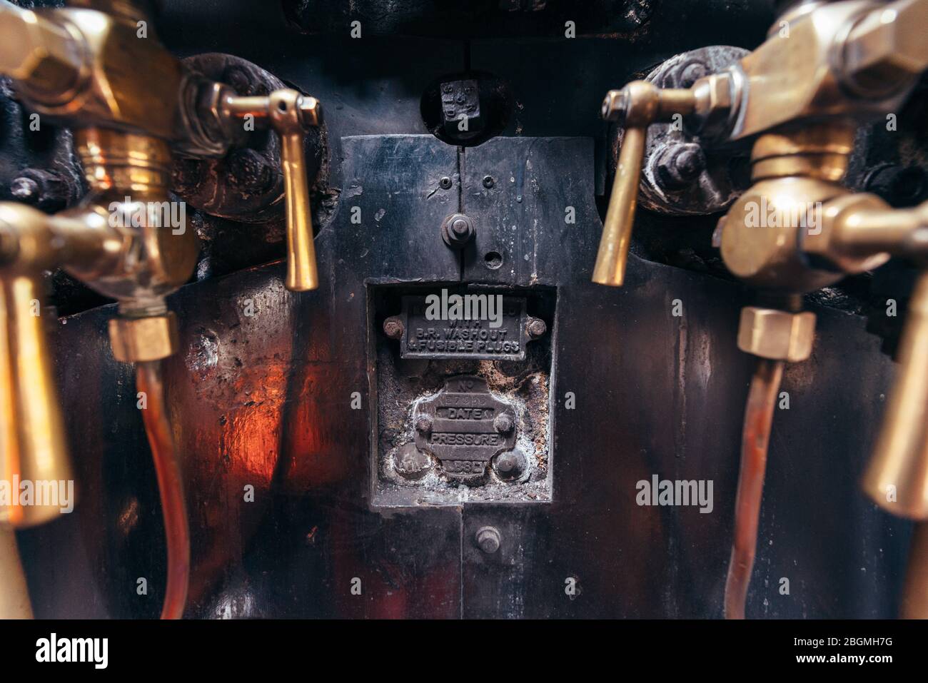 Large brass levers and copper pipes in the cab Working British steam ...