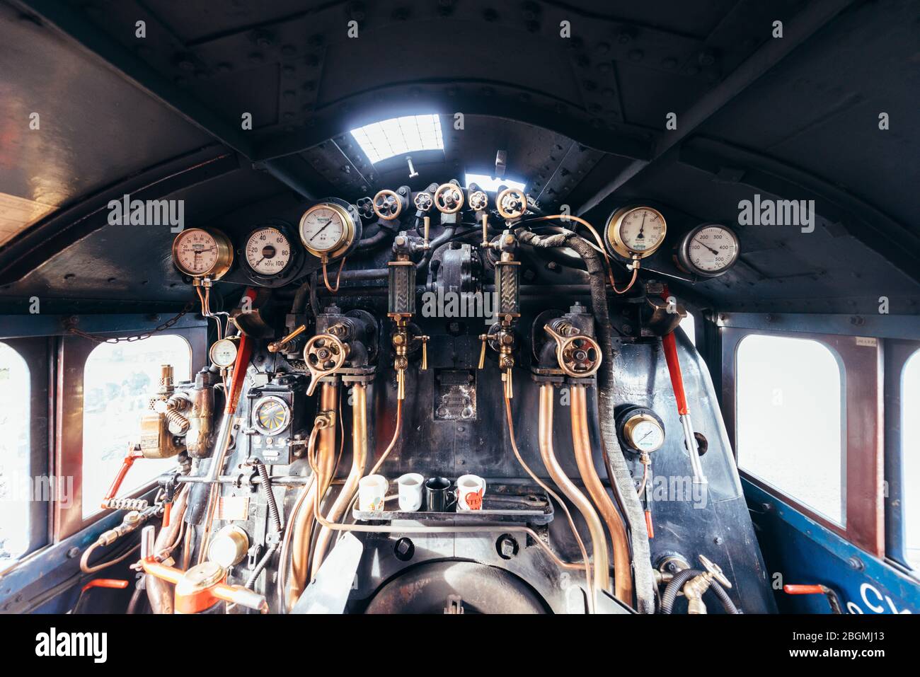 An assortment of brass dials and copper pipes in the cab Working ...