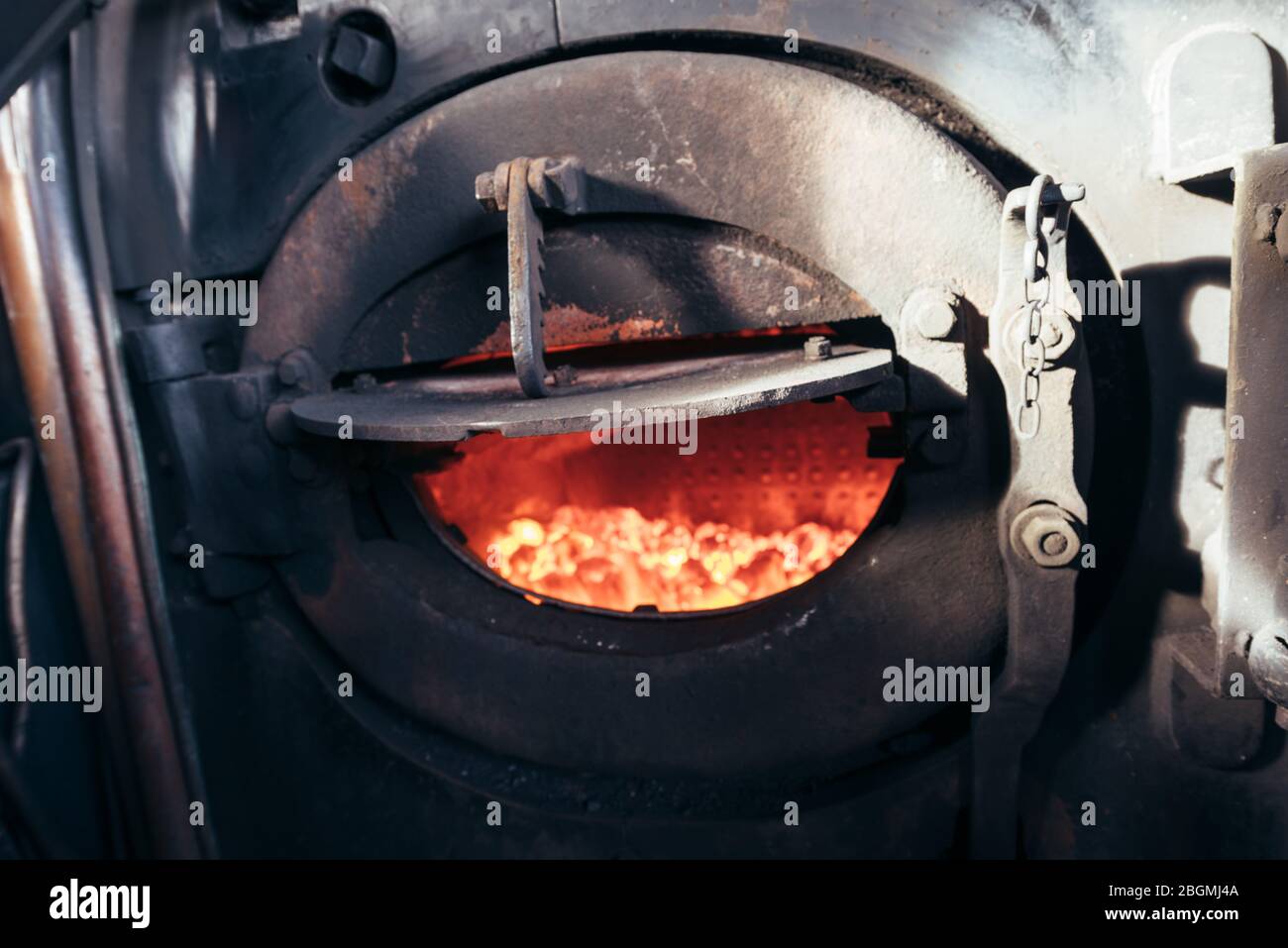 Coal burning orange in the cab firebox Working British steam locomotive ...