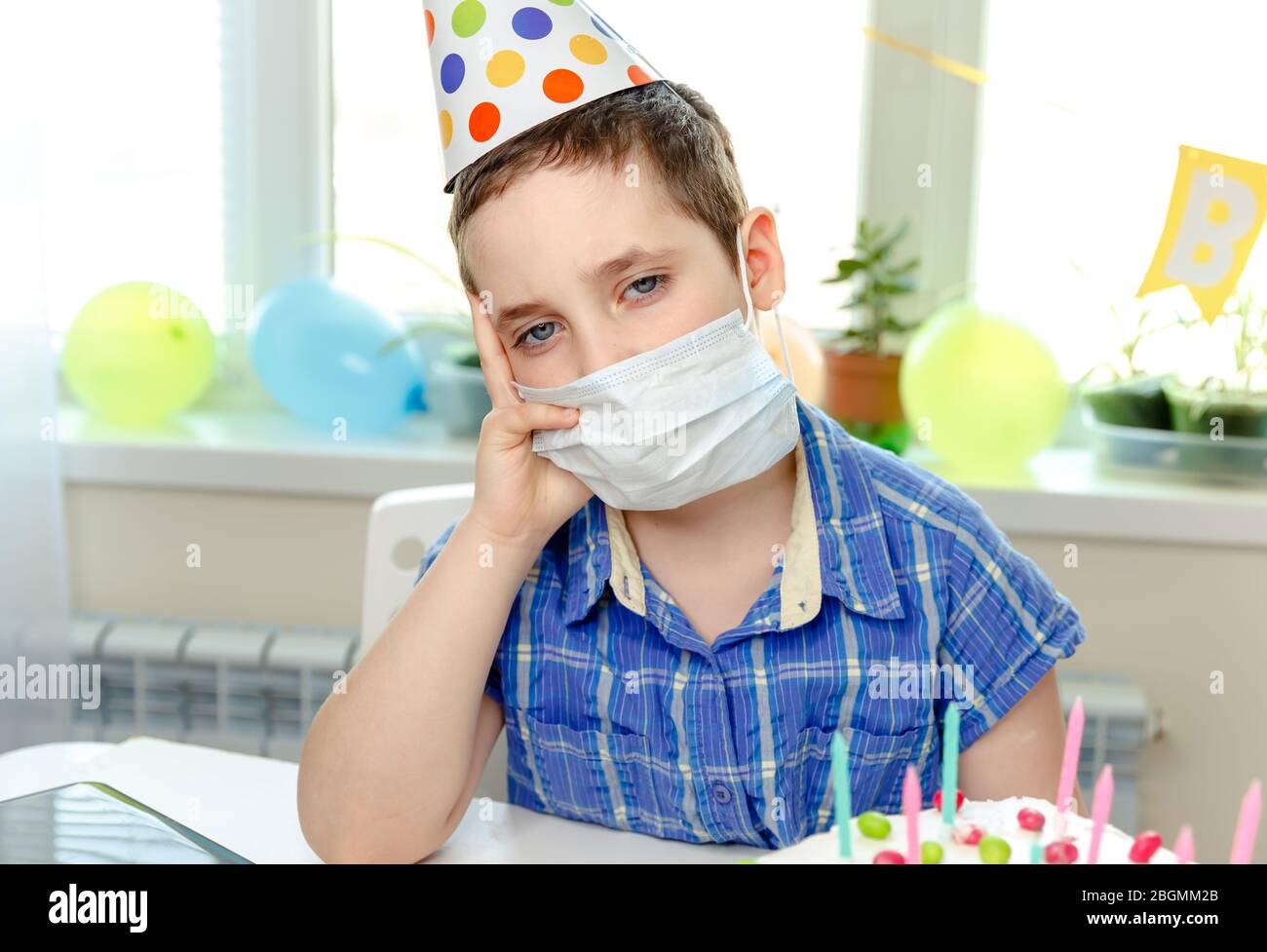 Sad kid at birthday party hi-res stock photography and images - Alamy