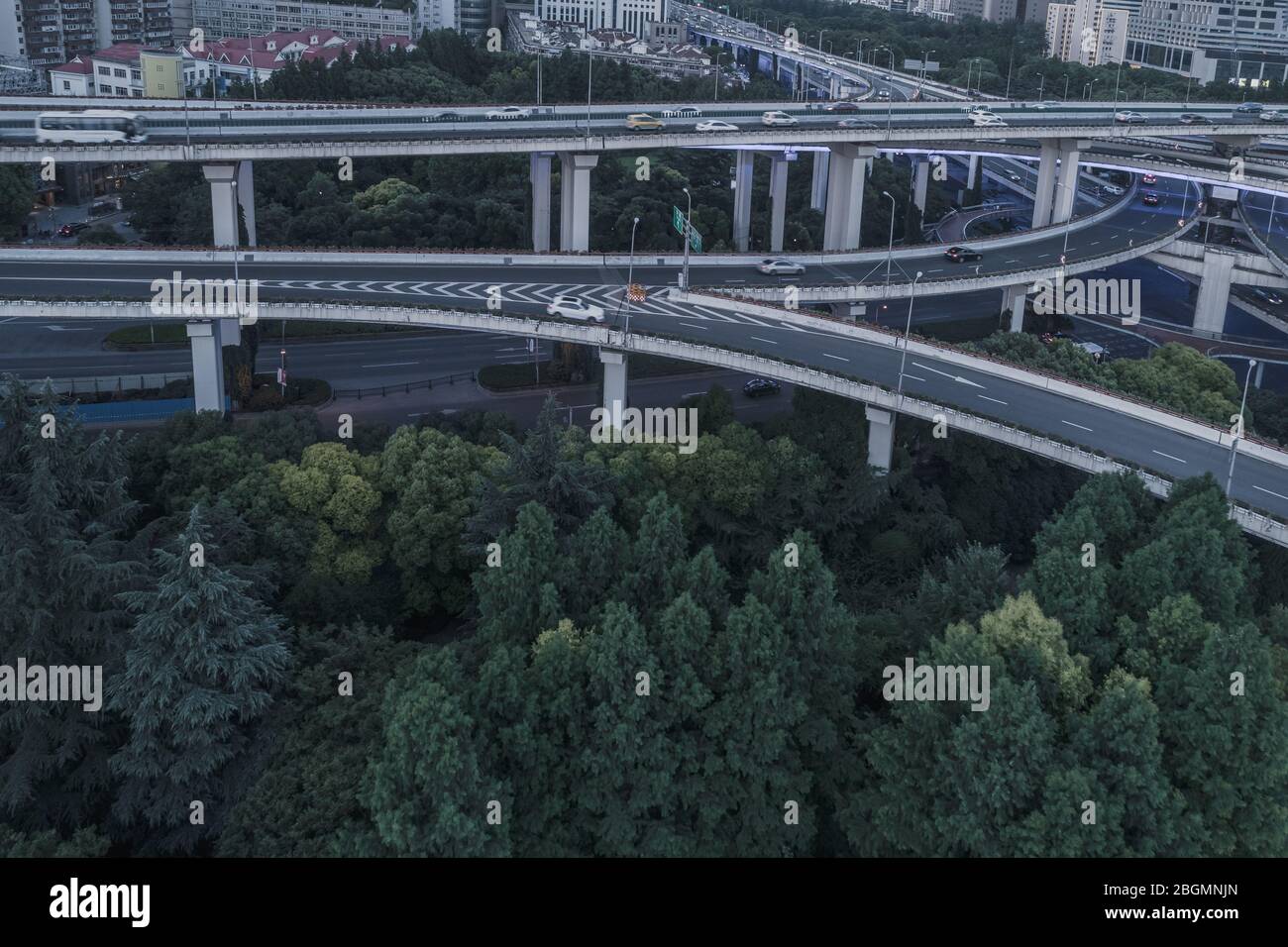 aerial view of highway interchange at dusk in shanghai city Stock Photo ...
