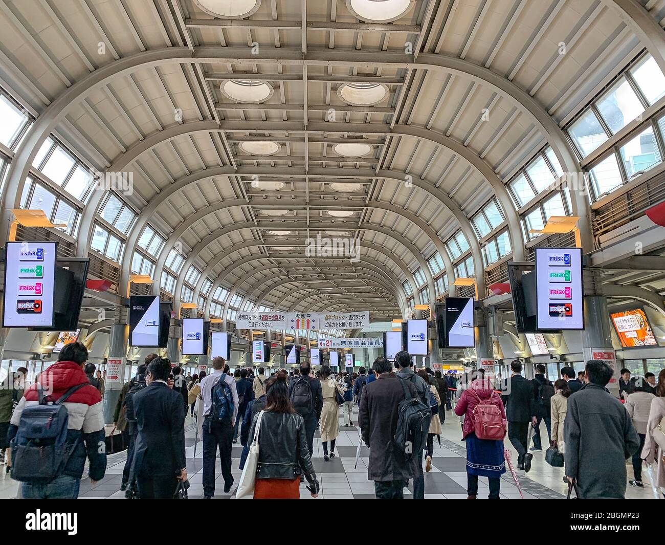 Commuters in a busy subway station at rush hour. Typical scene at a ...
