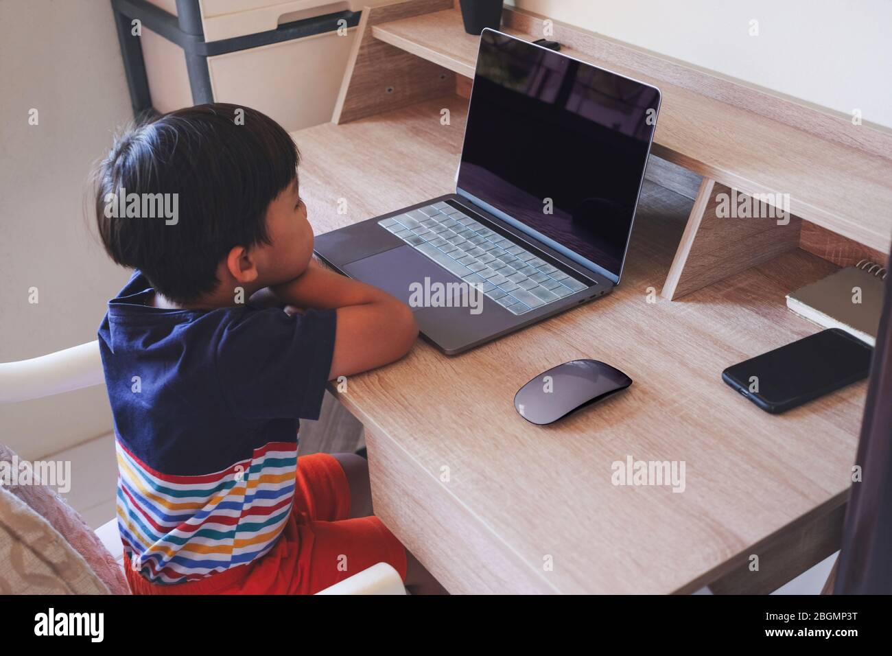 Boy watching computer game hi-res stock photography and images - Alamy