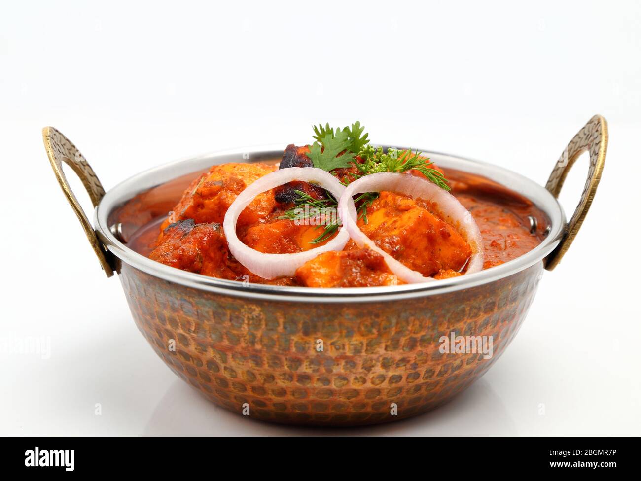Indian Food or Indian Curry in a copper brass serving bowl Stock Photo ...