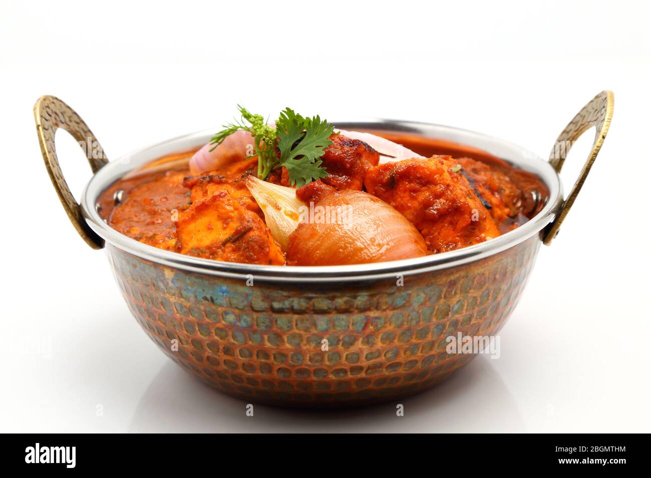 Indian Food or Indian Curry in a copper brass serving bowl Stock Photo ...