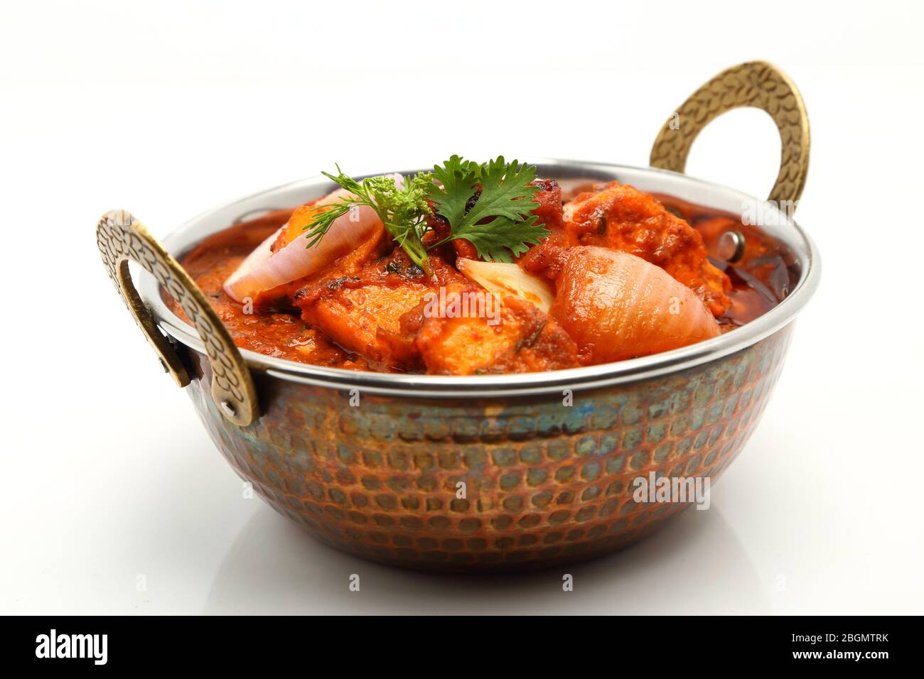 Indian Food or Indian Curry in a copper brass serving bowl Stock Photo ...