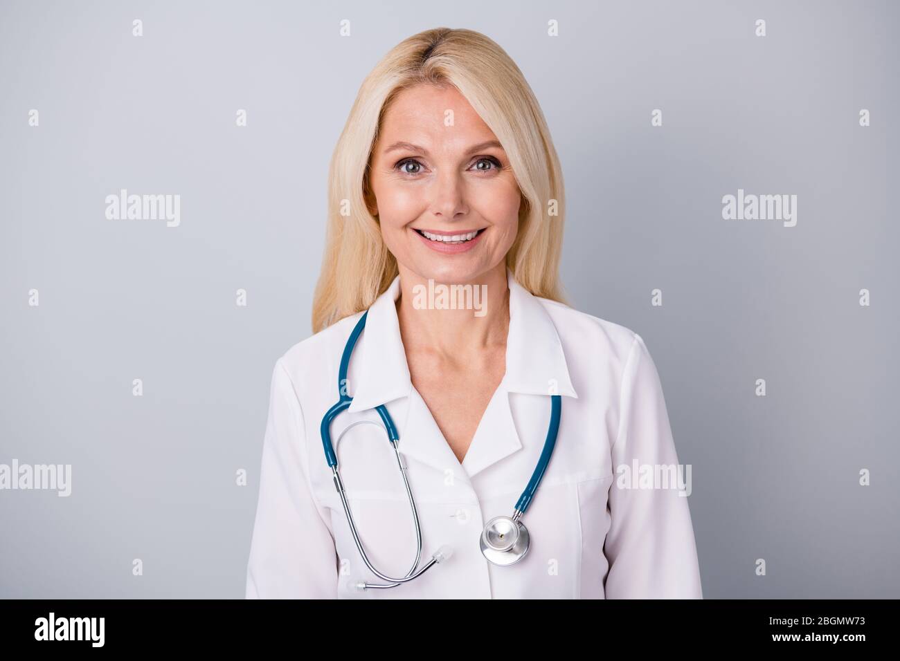 Closeup photo portrait of smart skilled old lady cardiologist with ...
