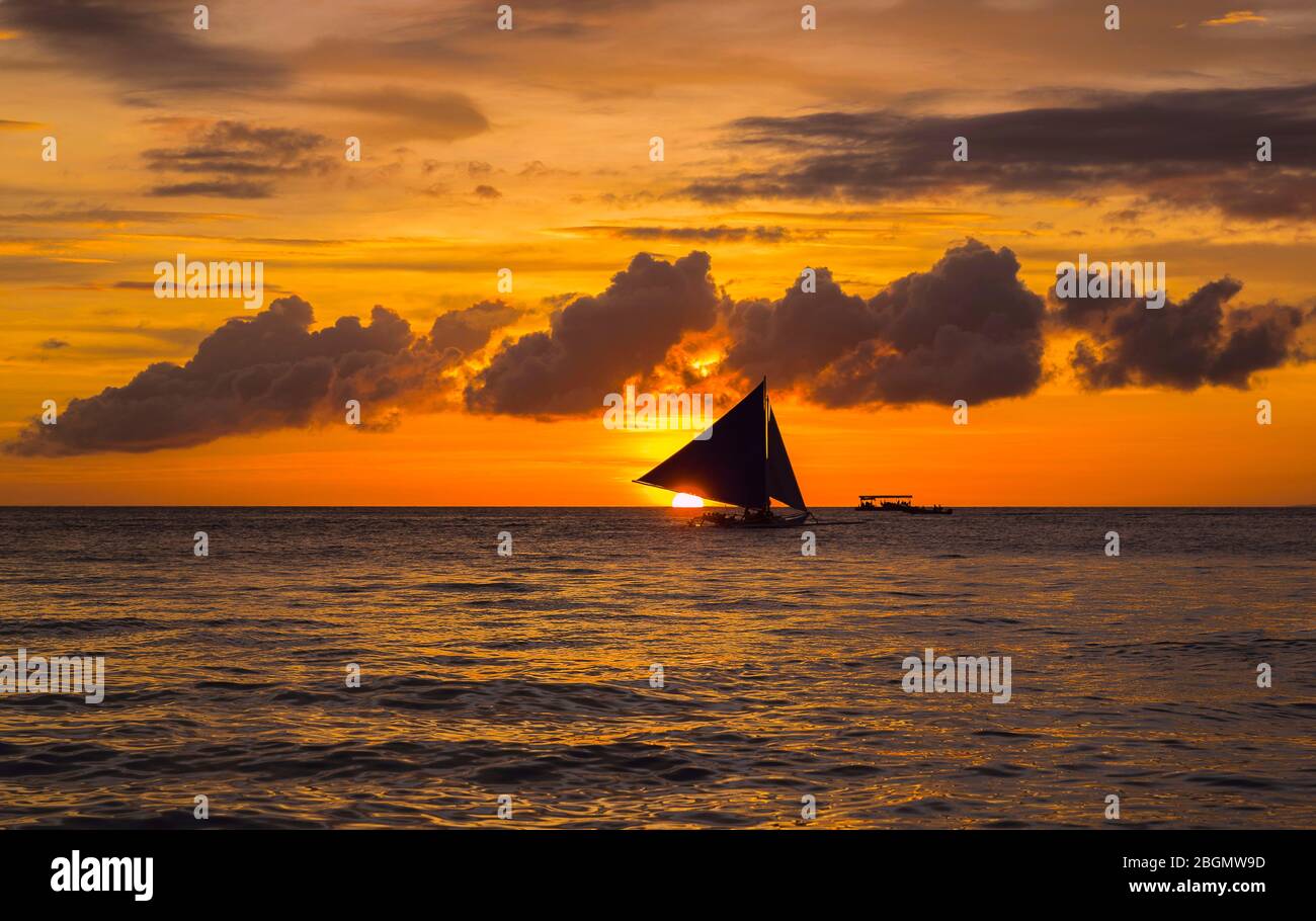 Sunset White beach path on Boracay island, Philippines Stock Photo - Alamy