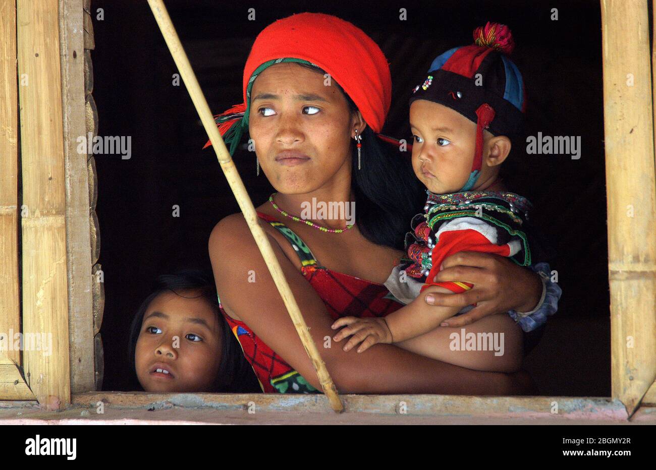 Window of the Dai mother and child Cangyuan Yunnan Stock Photo - Alamy