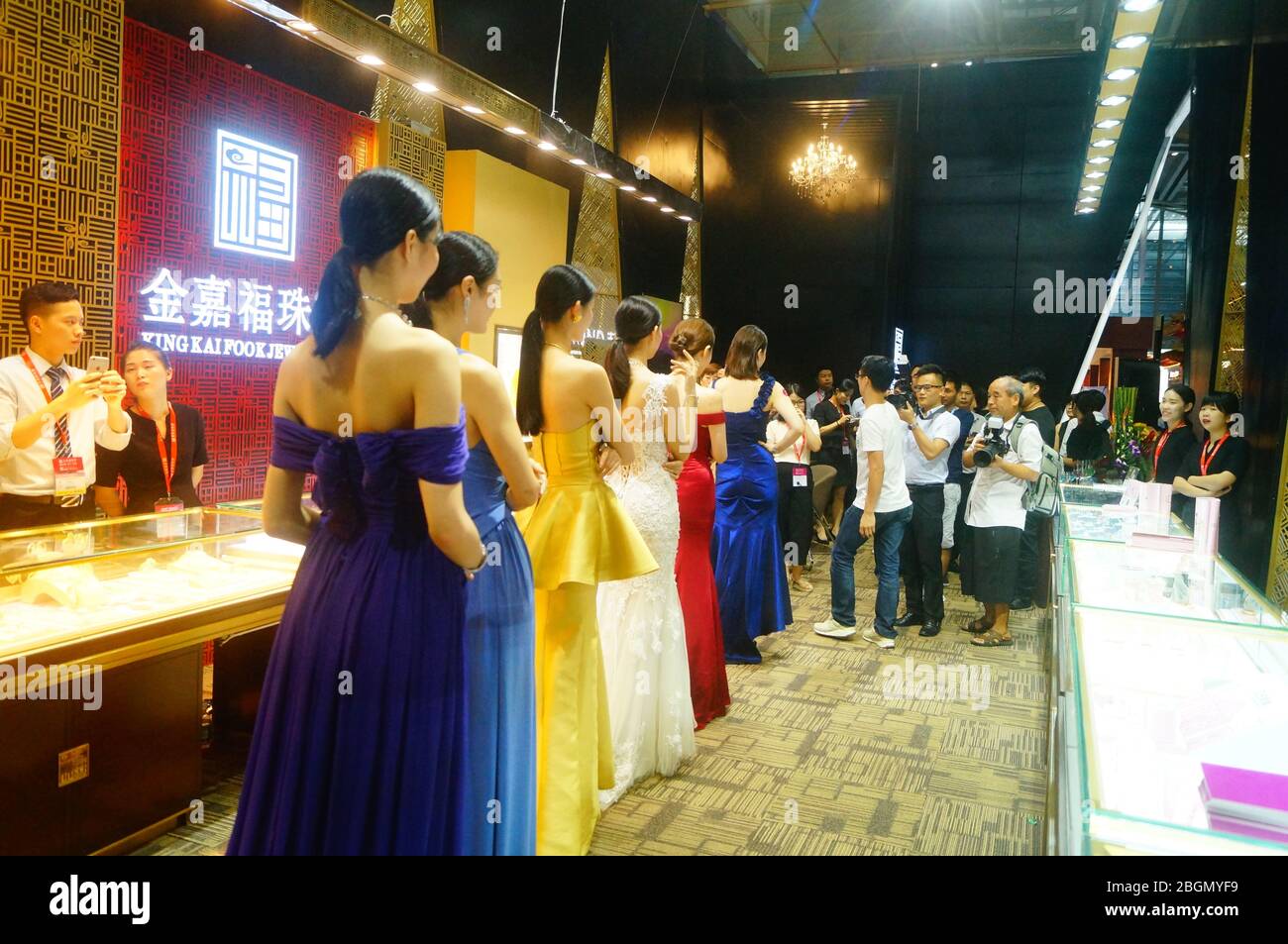 Female models show new gold jewelry Stock Photo - Alamy