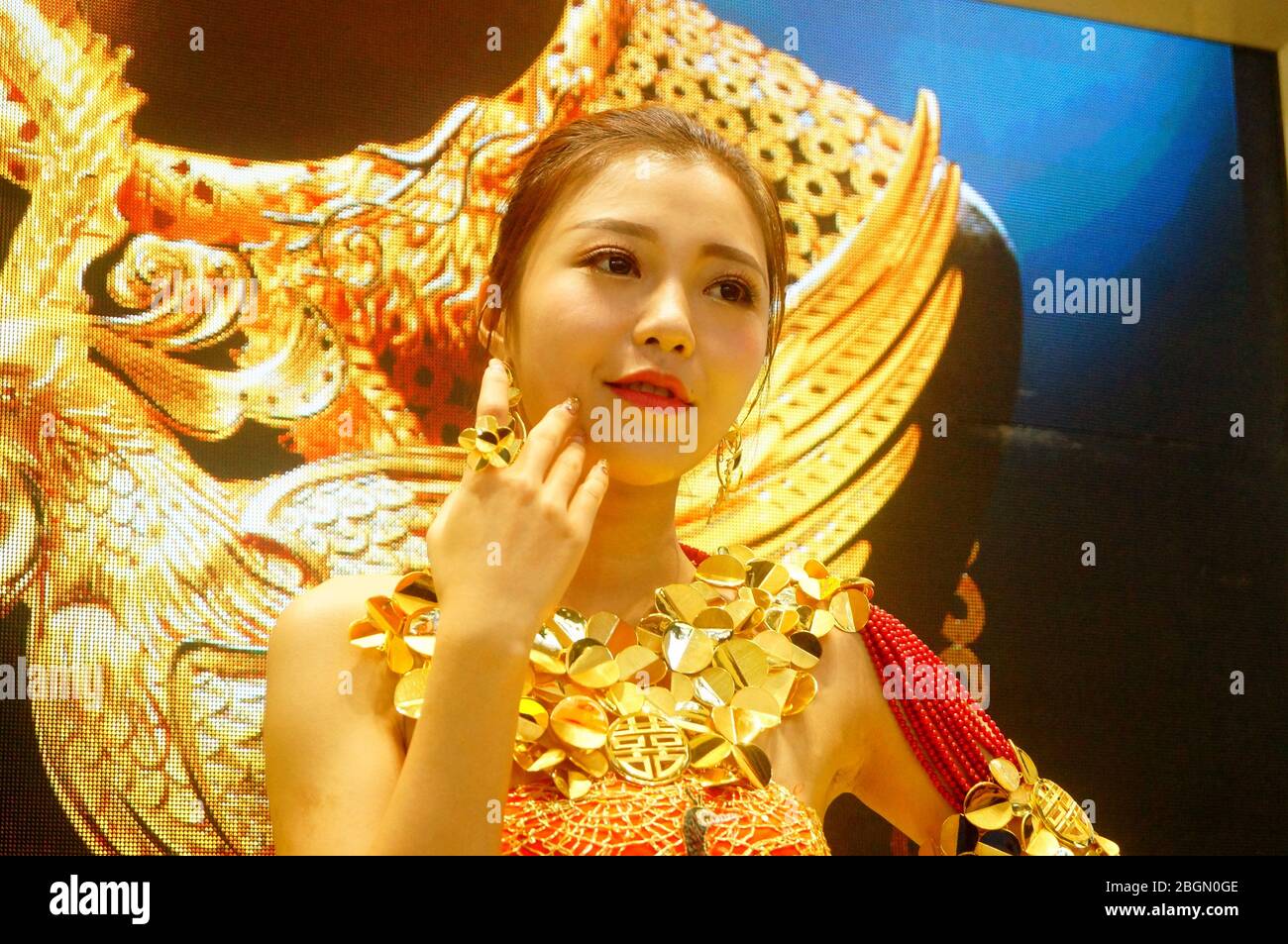 Female models show new gold jewelry Stock Photo - Alamy