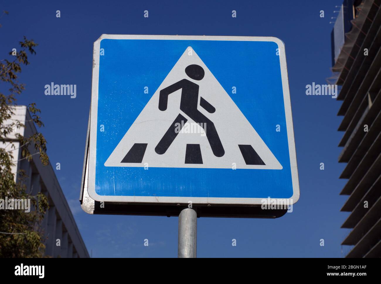 pedestrian crossing sign on street Stock Photo - Alamy