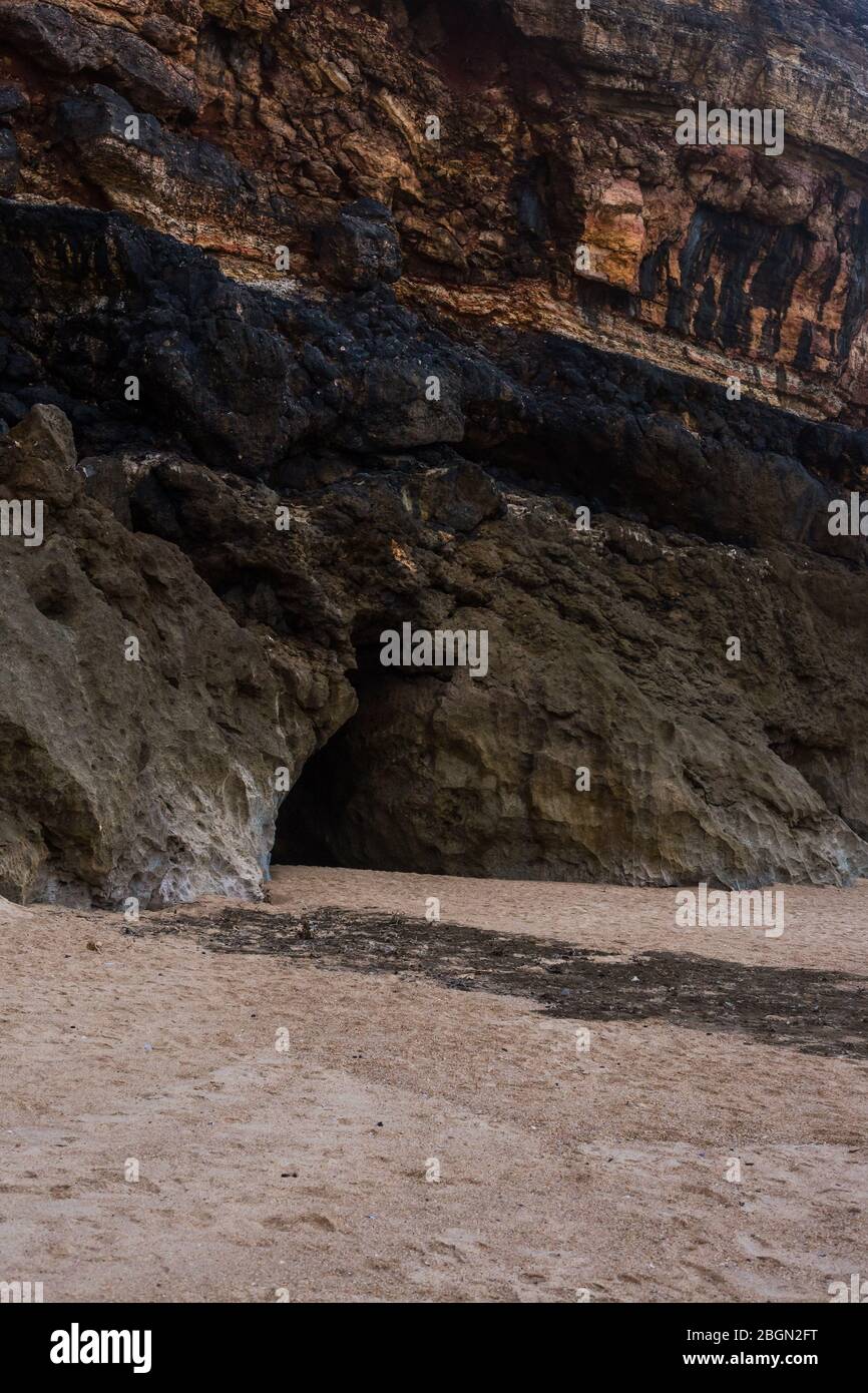 Beach of Nazare, Portugal. Cliff and sand Stock Photo - Alamy