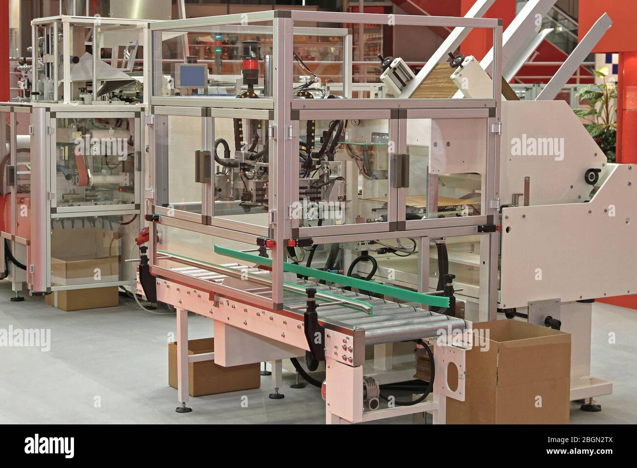 Automated Case Packing Machine Conveyor Rollers in Factory Stock Photo ...