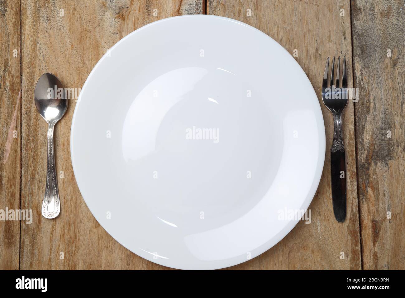 Wooden round dining table hi-res stock photography and images - Alamy