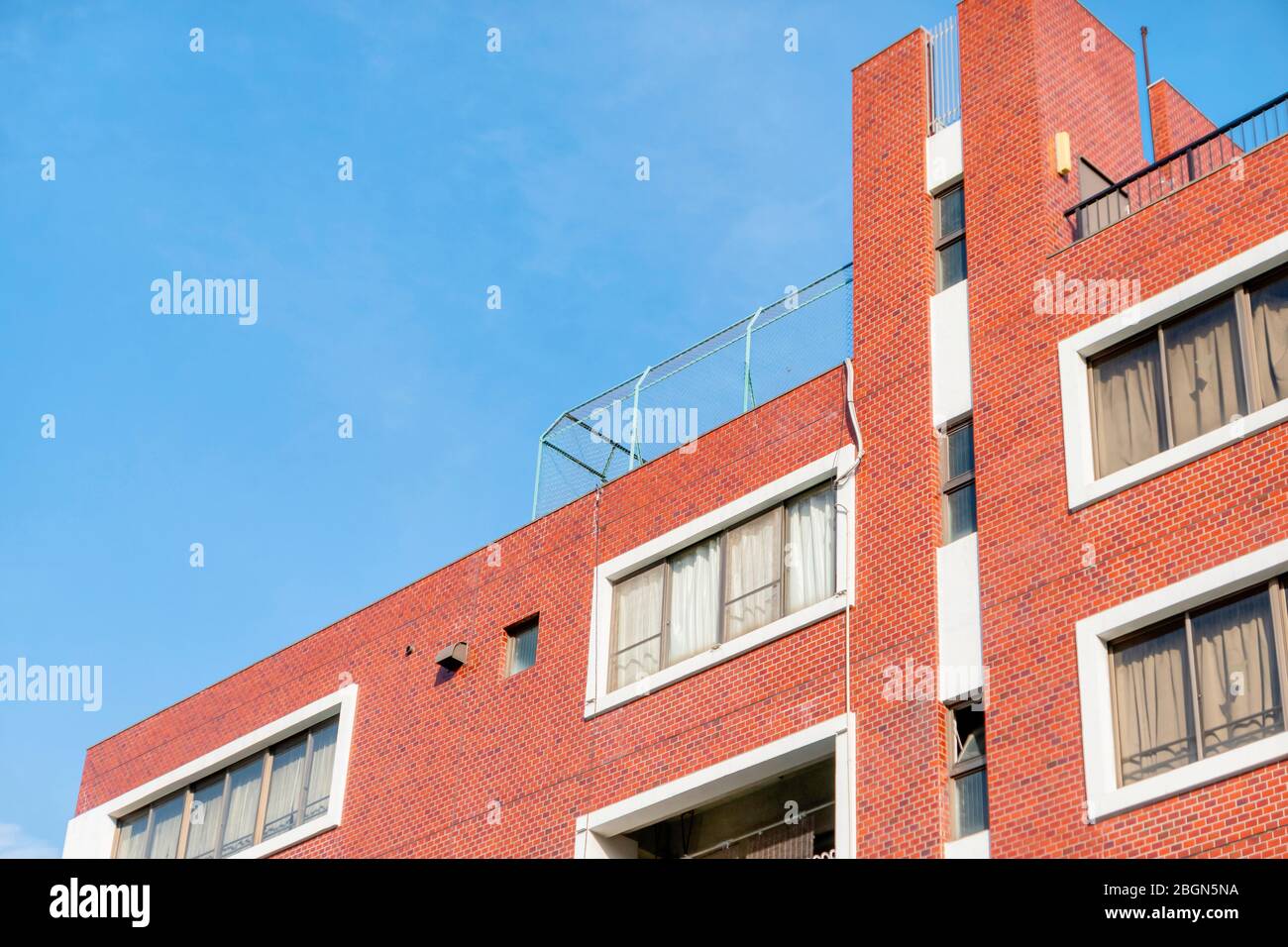 The dock of building which was built from red brick with blue sky ...