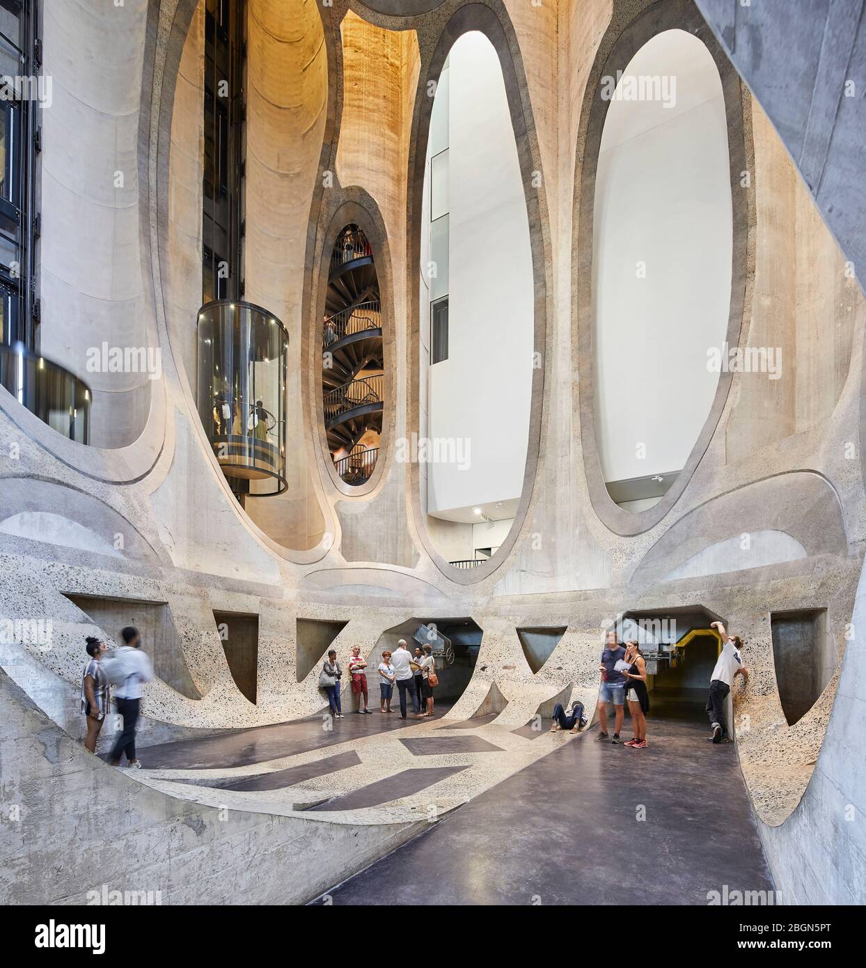 Central atrium with concrete tubes exposing structure. Zeitz MOCAA ...