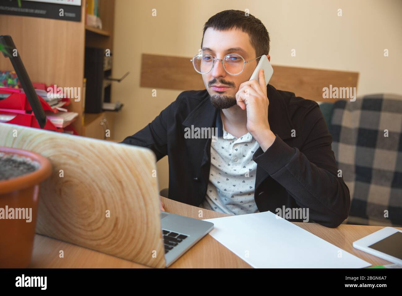 Talking on phone. Caucasian entrepreneur, businessman, manager working ...