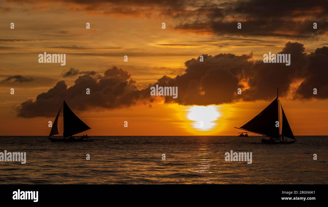 Sunset White beach path on Boracay island, Philippines Stock Photo - Alamy
