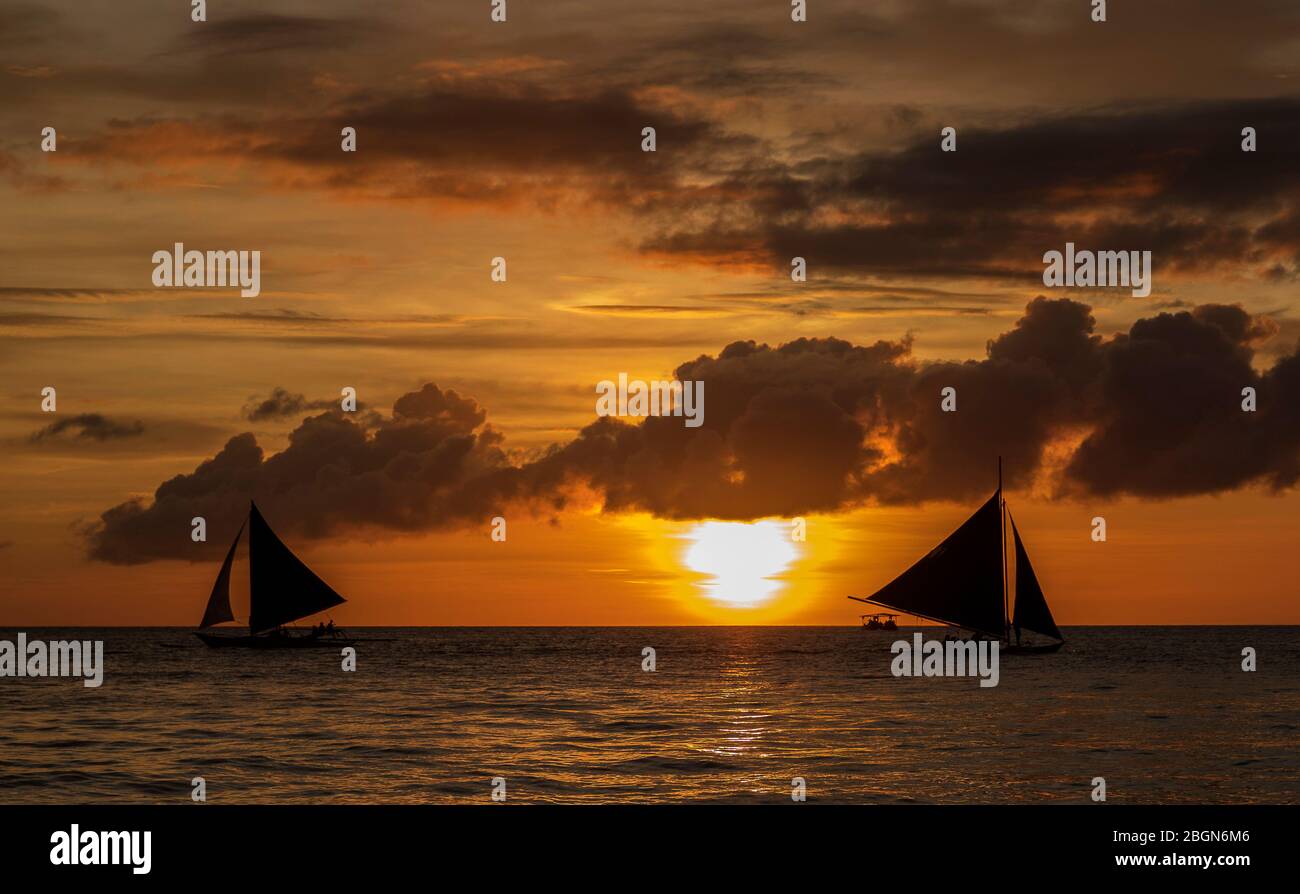 Sunset White beach path on Boracay island, Philippines Stock Photo - Alamy