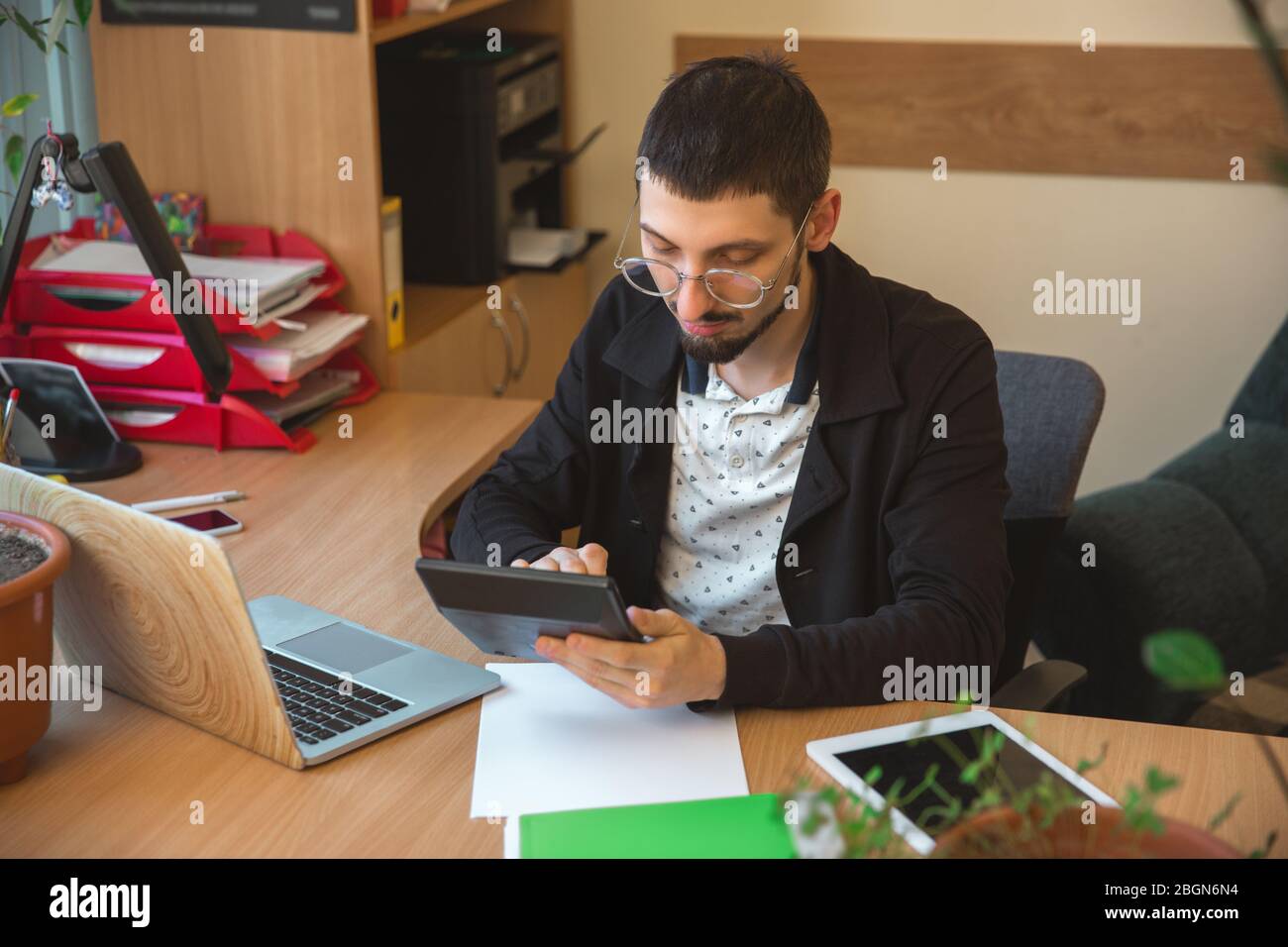 Counting. Caucasian entrepreneur, businessman, manager working ...