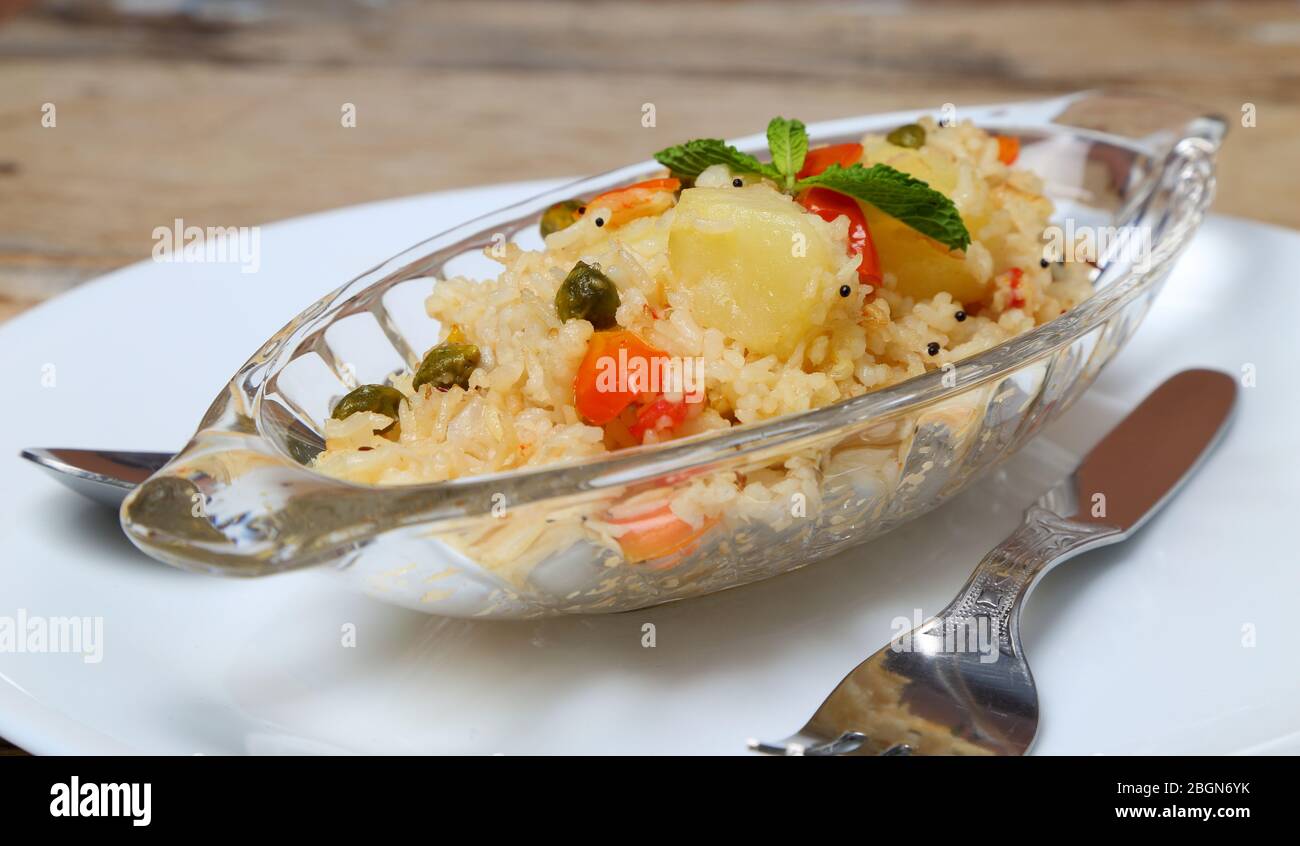 indian rice dish or veg biryani, veg pulav, Indian vegetable pulao in a ...