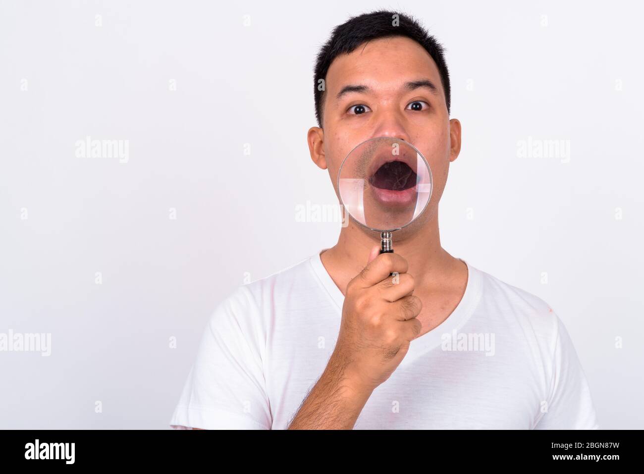Man with magnifying glass hi-res stock photography and images - Alamy