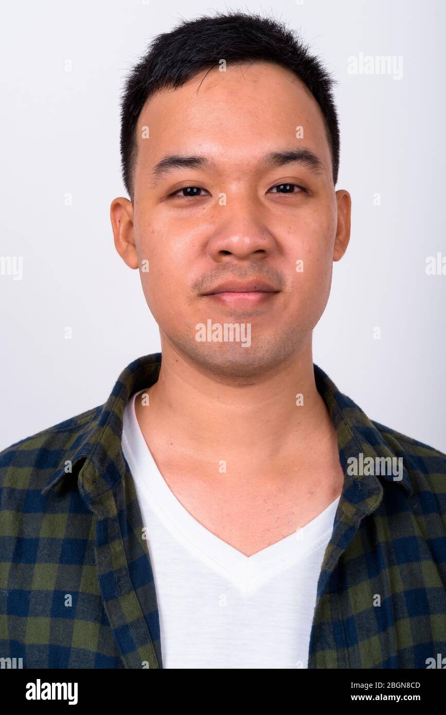 Young asian guy looking camera hi-res stock photography and images - Alamy