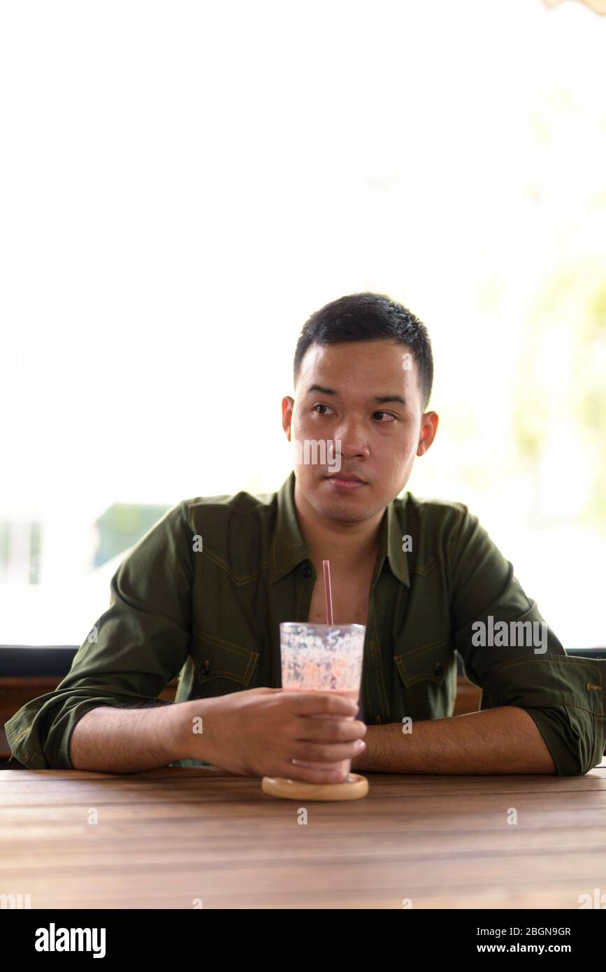 Guy drinking shake hi-res stock photography and images - Alamy