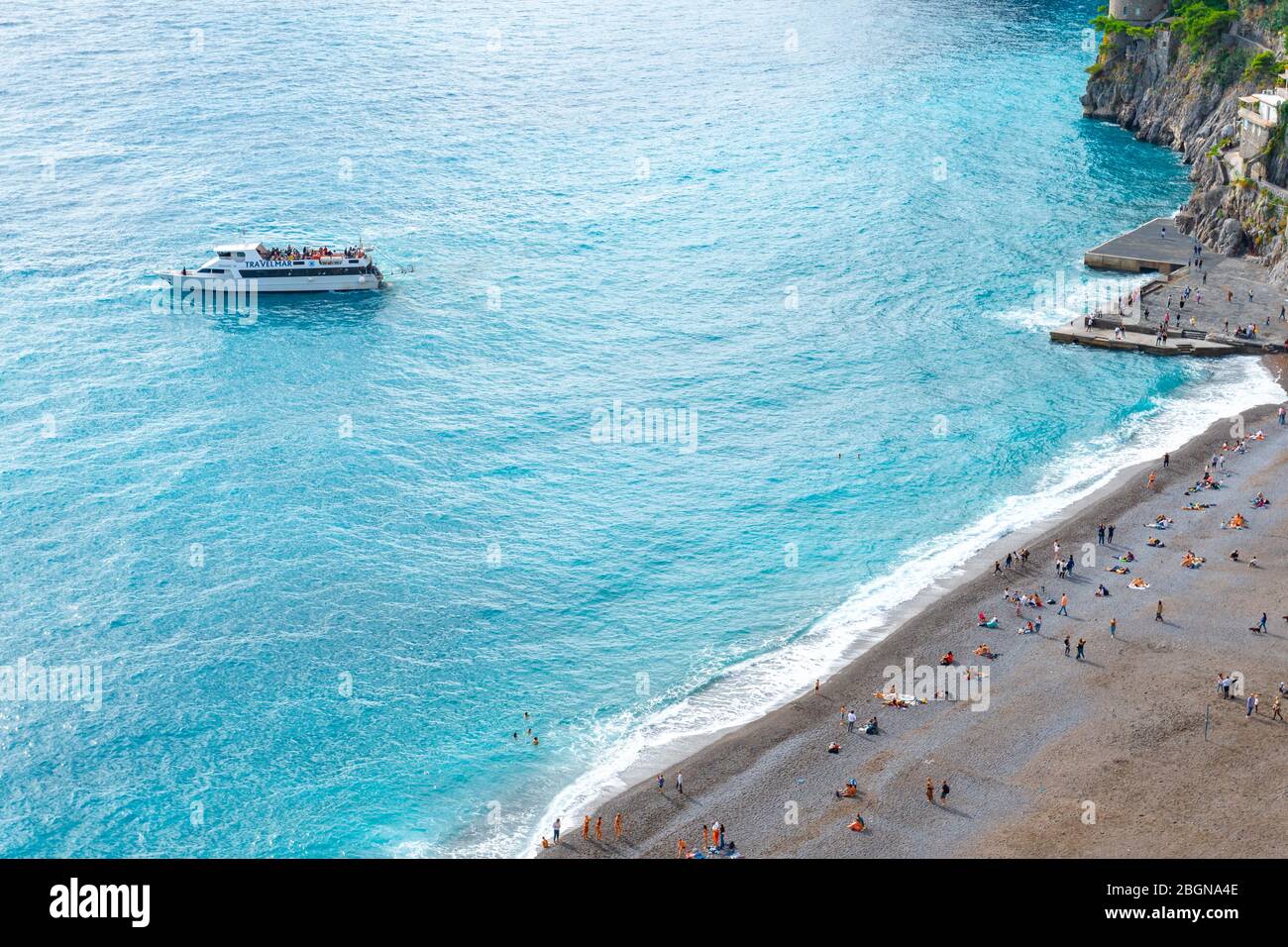 Positano, Italy - 2 November, 2019: People, sunbathing and swimming in ...