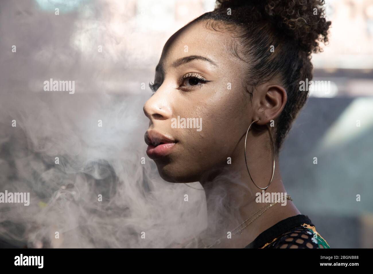 Girl Blowing Smoke Rings