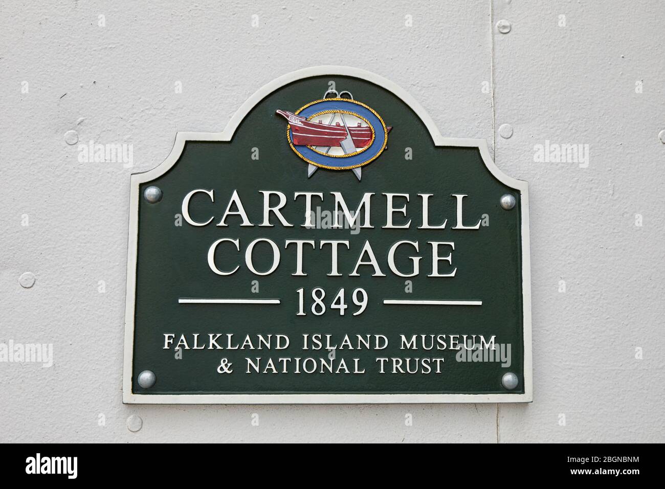 Cartmell Cottage sign on Pioneer Row in Stanley, Falkland Islands ...