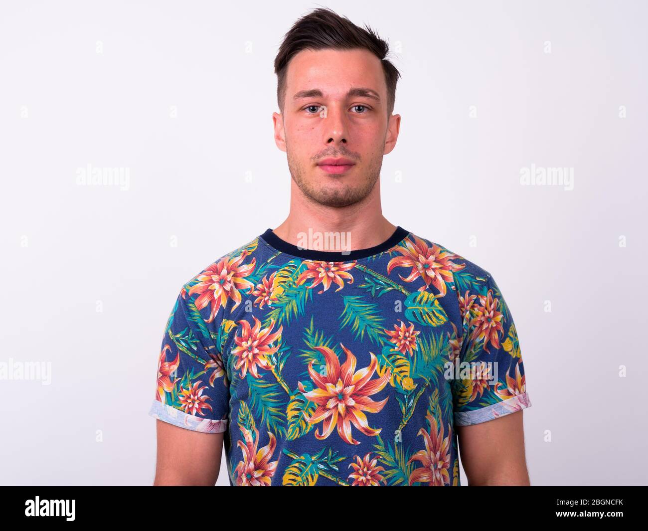 Face of young handsome tourist man looking at camera Stock Photo - Alamy