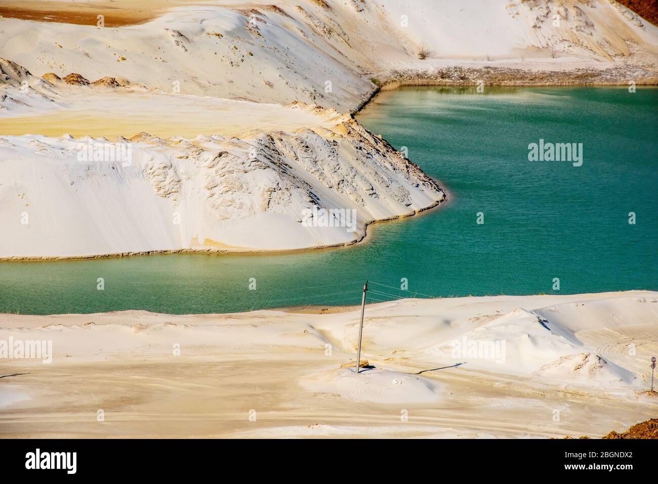 quartz white sand quarry with blue lake Stock Photo - Alamy