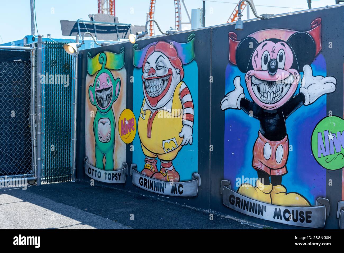 Teletubby, Ronald McDonald, and Mickey Mouse caricatures at Coney Art ...