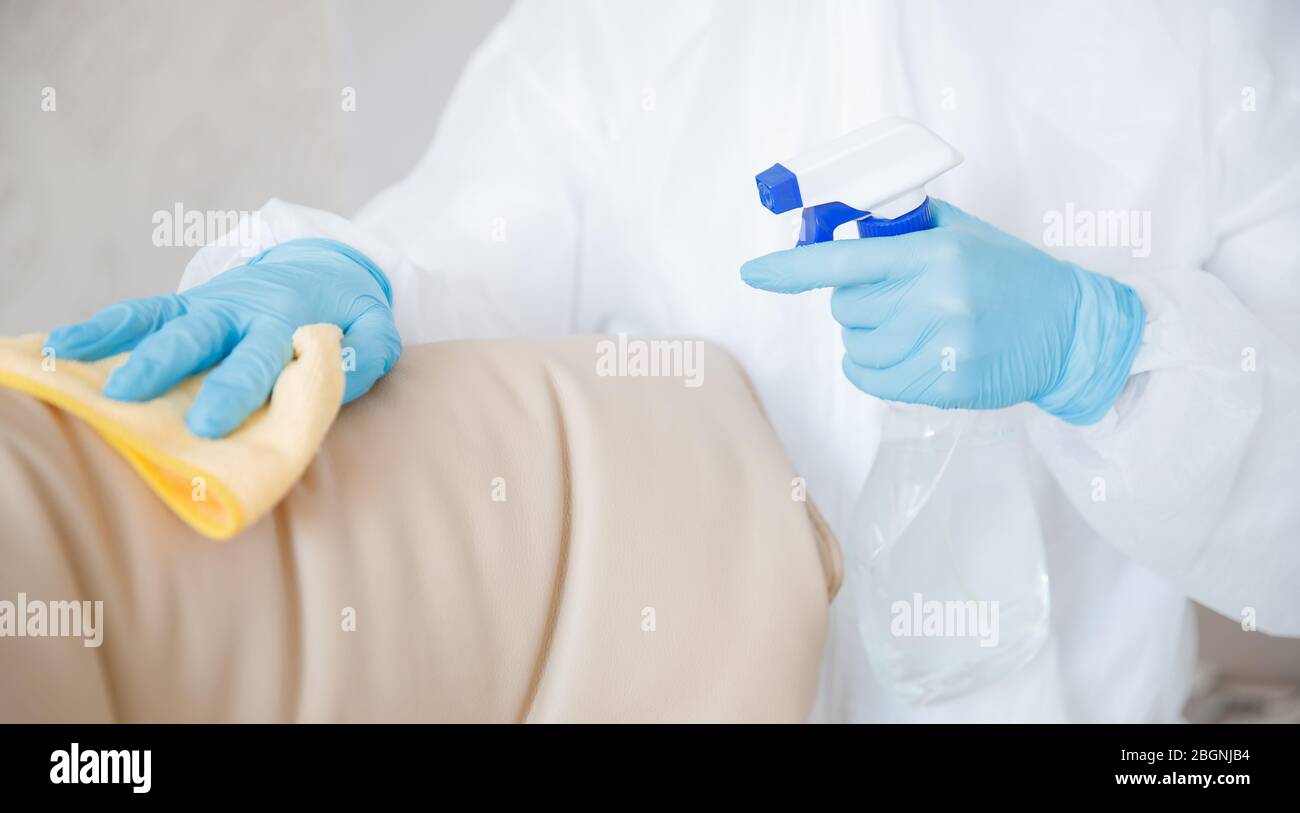 Cleaning service disinfects hotel room from coronavirus and germs ...