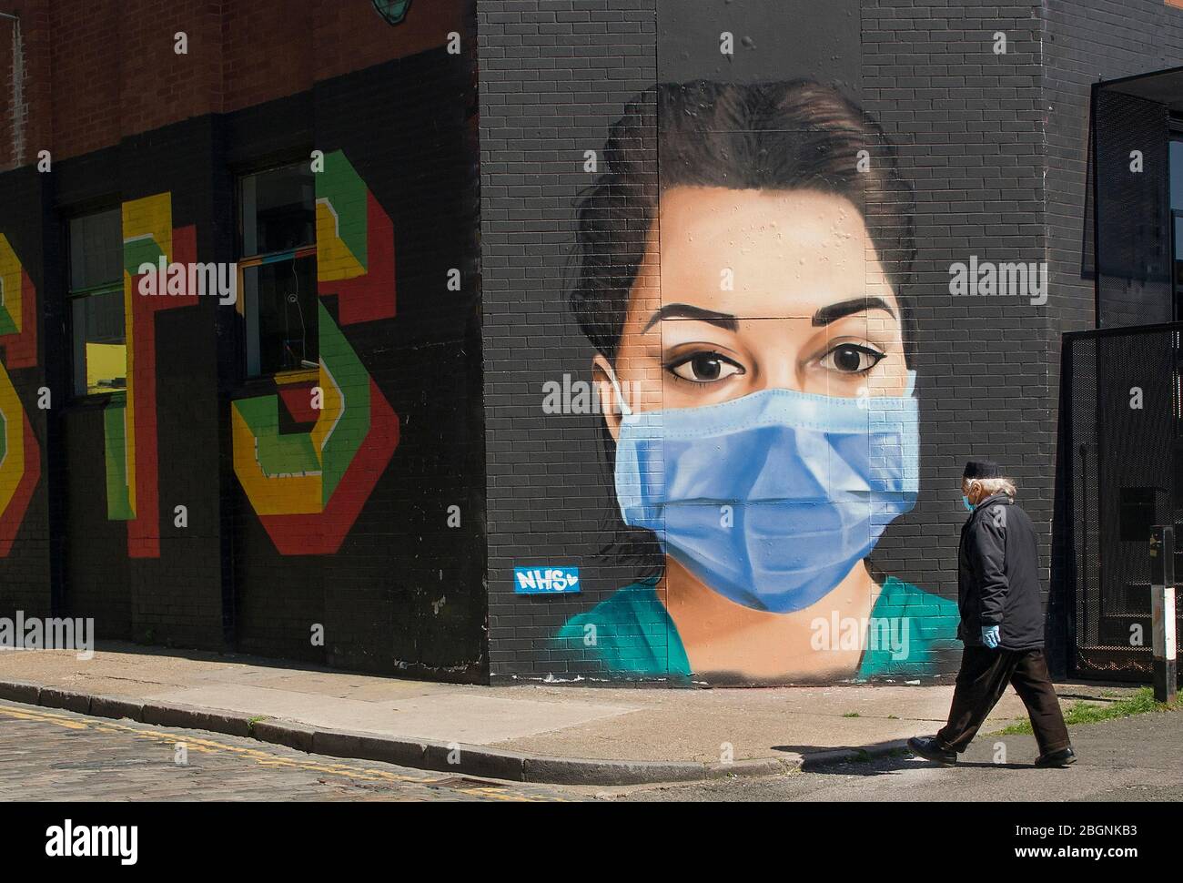 Local resident walking past street art supporting the NHS in East ...