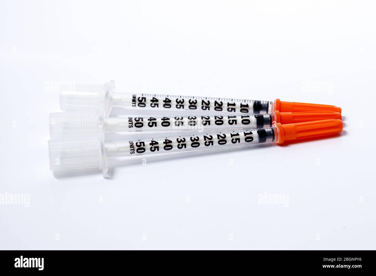 syringe over white background Stock Photo - Alamy