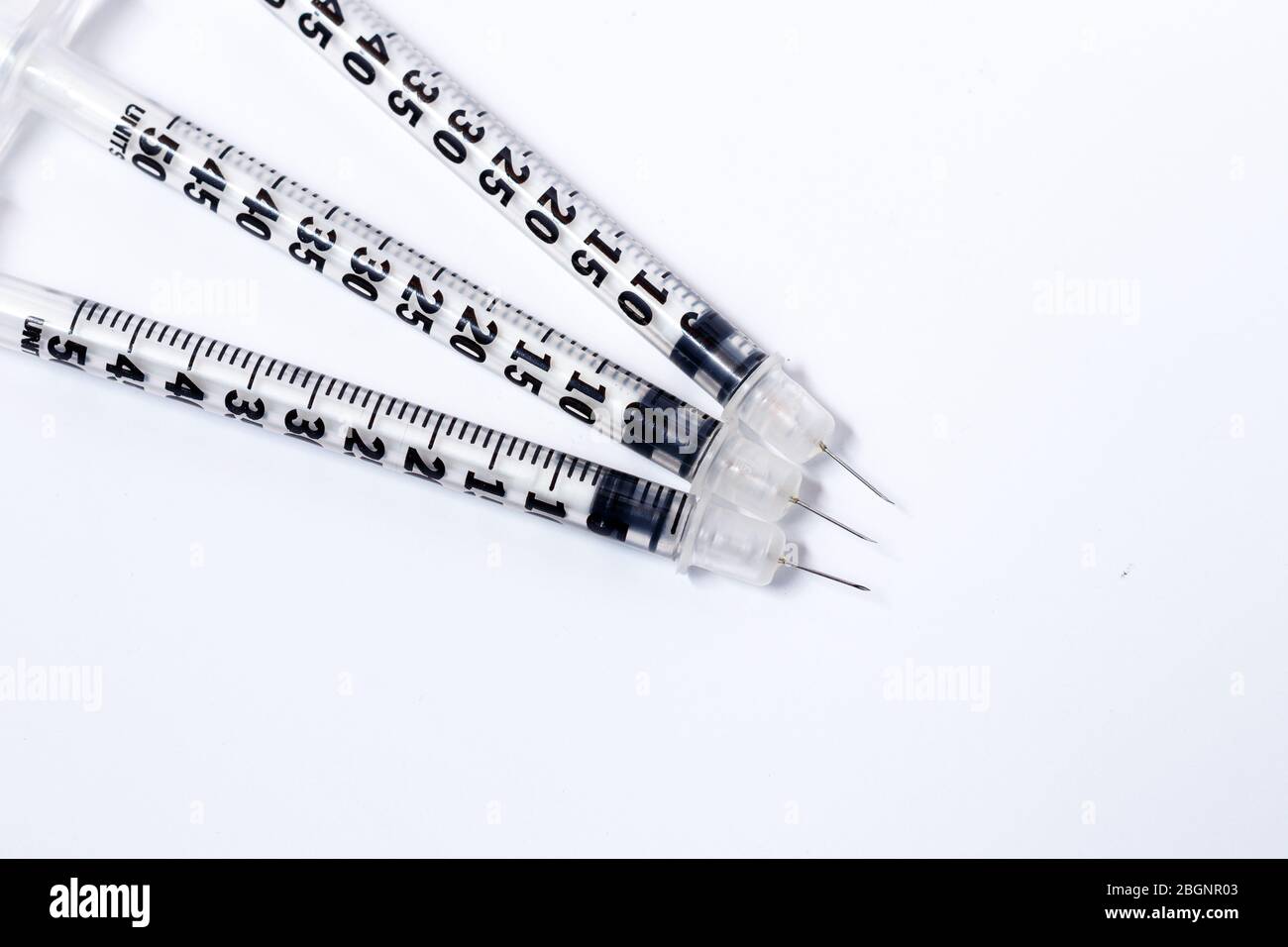 syringe over white background Stock Photo - Alamy